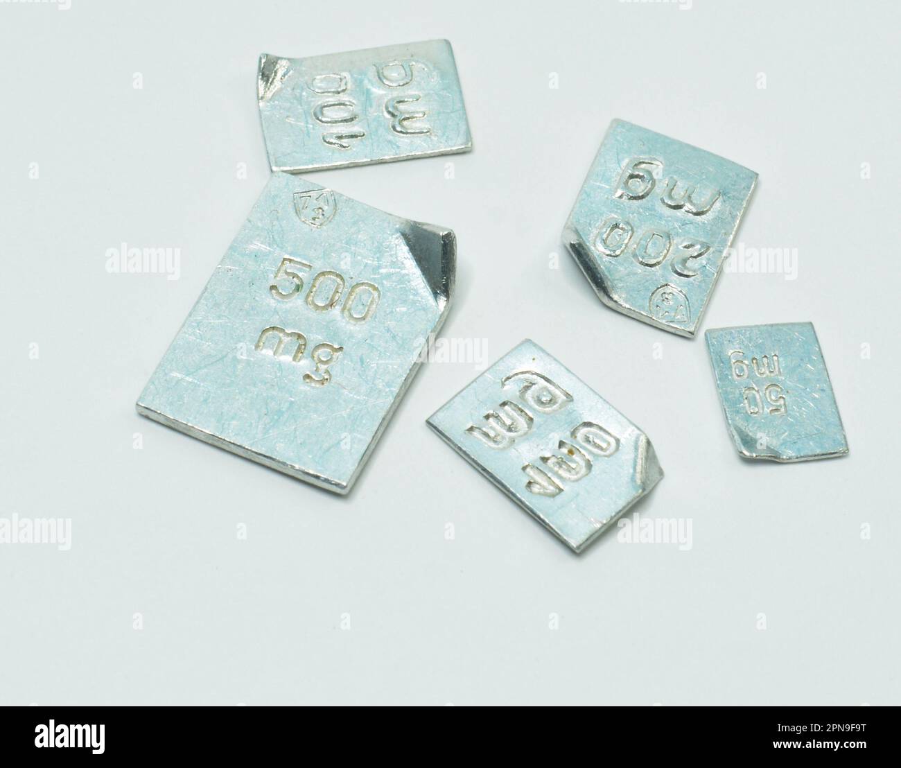 Set of Vintage Small gram Scale Calibration weights isolated on gray ...