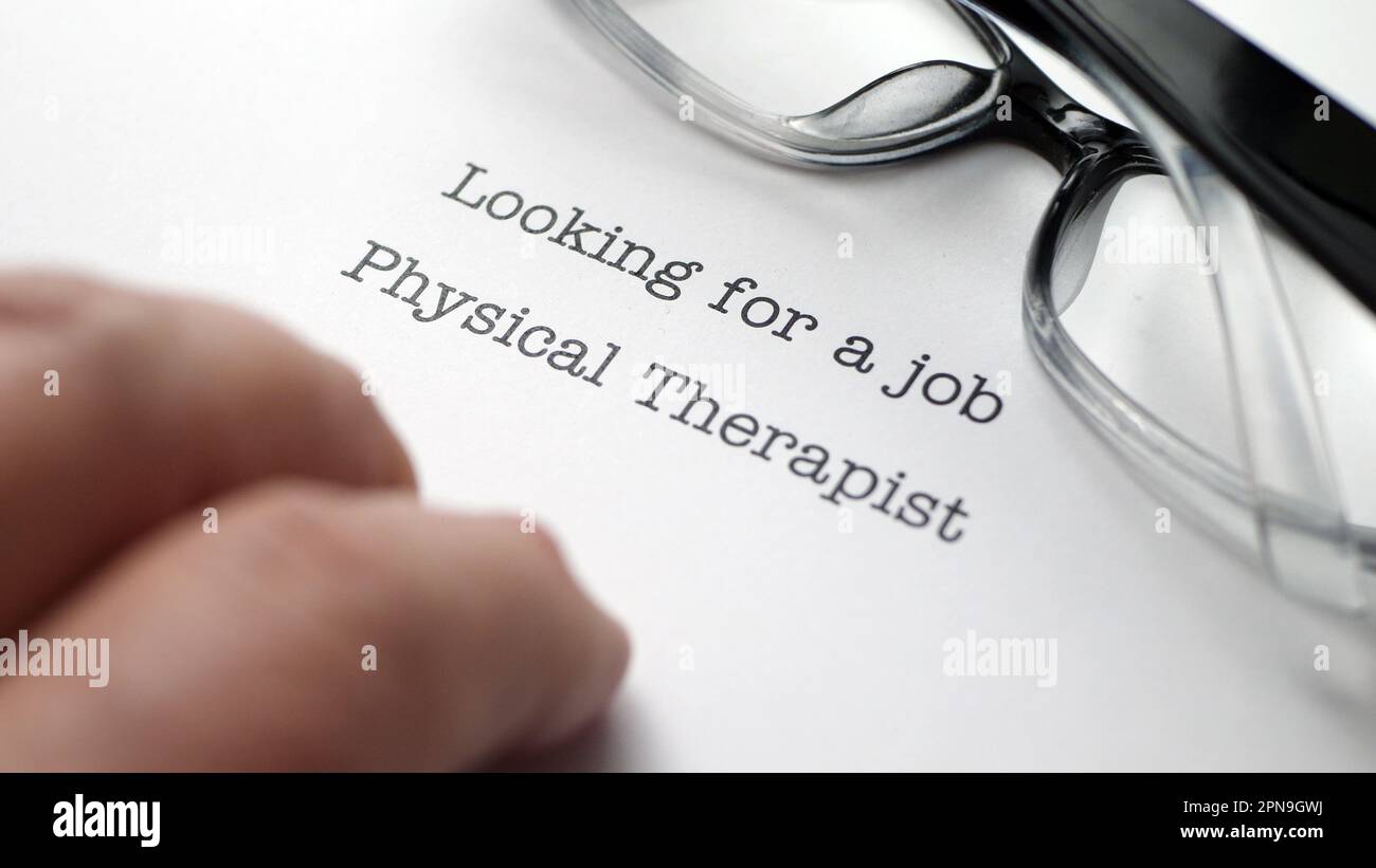 Finger tapping on physical therapist job form Stock Photo - Alamy
