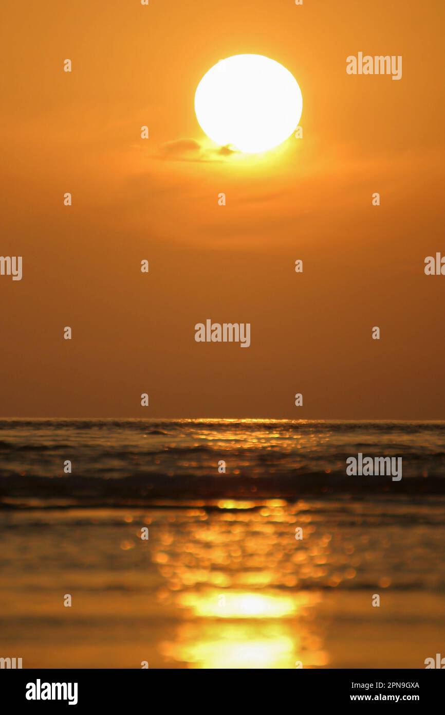 Ocean sunset, UK beach Stock Photo - Alamy