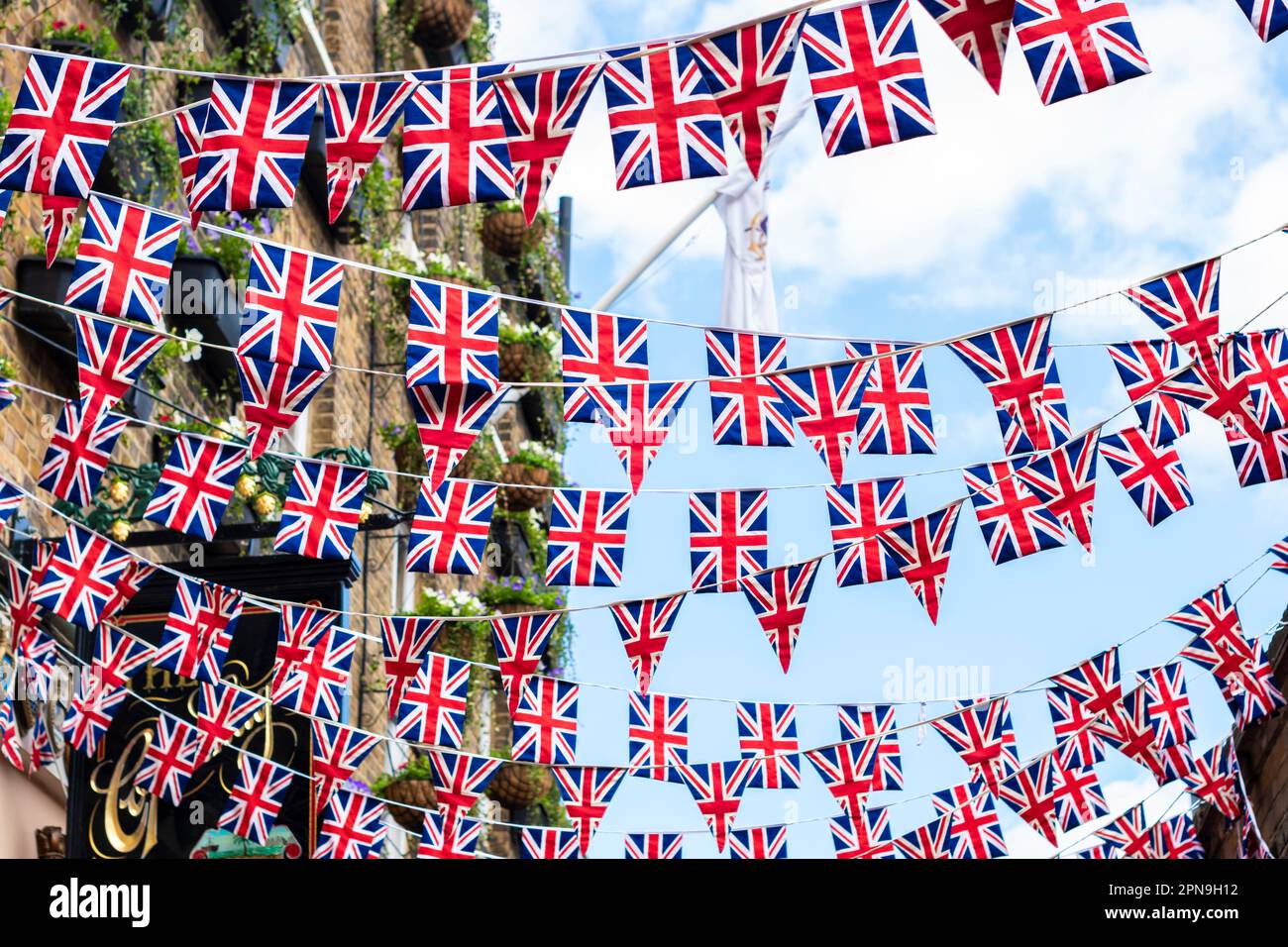 Union Jack flags hanging ready to national holiday celebration Stock ...