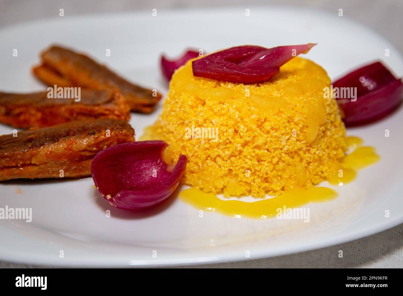 Traditional couscous with sardines and pickled onions. Brazilian ...