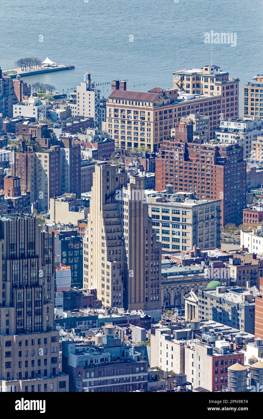 80 Eighth Avenue uses contrasting-colored brick stripes to accentuate its verticality over a ...