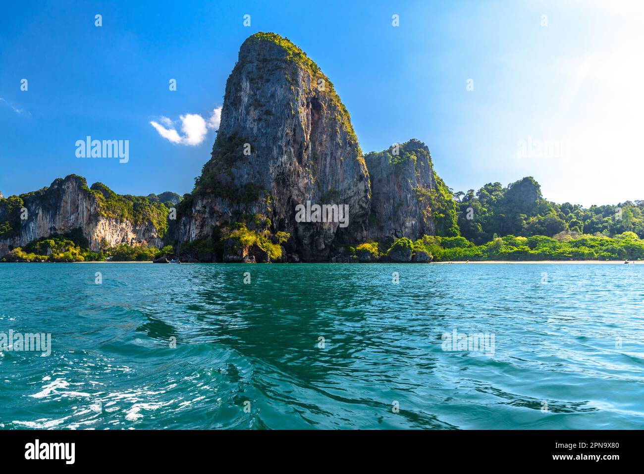 Huge cliff rocks in azure water, Railay beach, Ao Nang, Krabi, Thailand ...