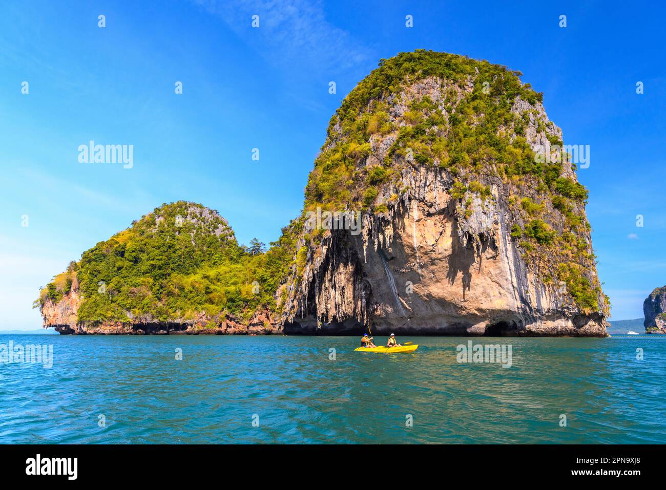 Huge cliff rock in azure water, Ko Rang Nok, Ao Phra Nang Beach, Ao ...