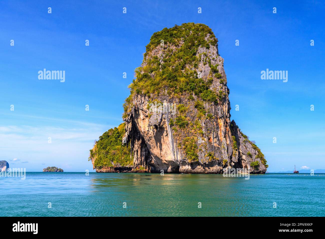 Huge cliff rock in azure water, Ko Rang Nok, Ao Phra Nang Beach, Ao ...