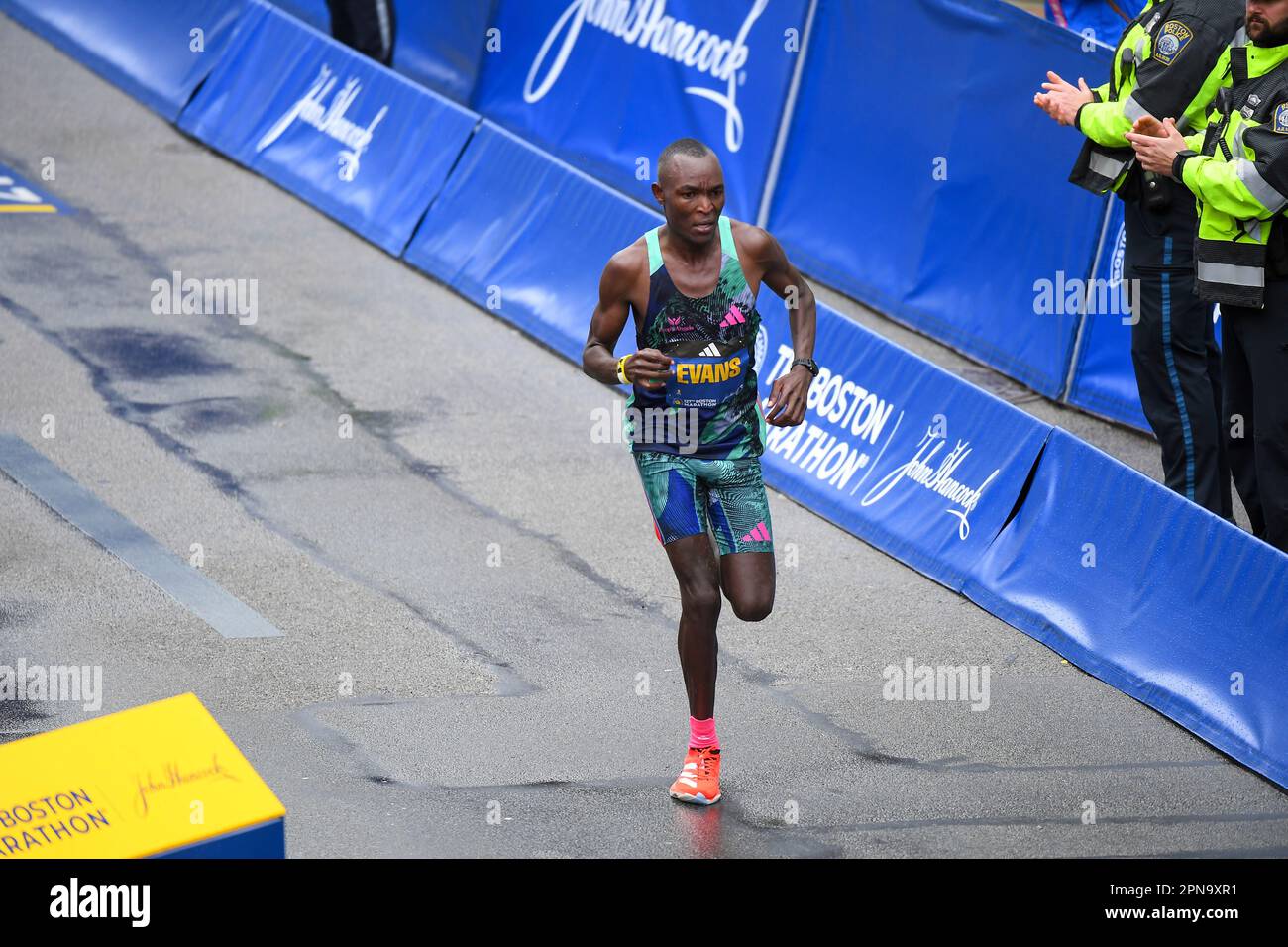 BOSTON, MA - APRIL 17: Evans Chebet of Kenya runs to the finish line in first place in the men's ...