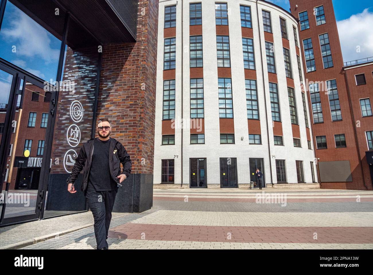 Russia, Moscow. A man walks in a city street Stock Photo - Alamy