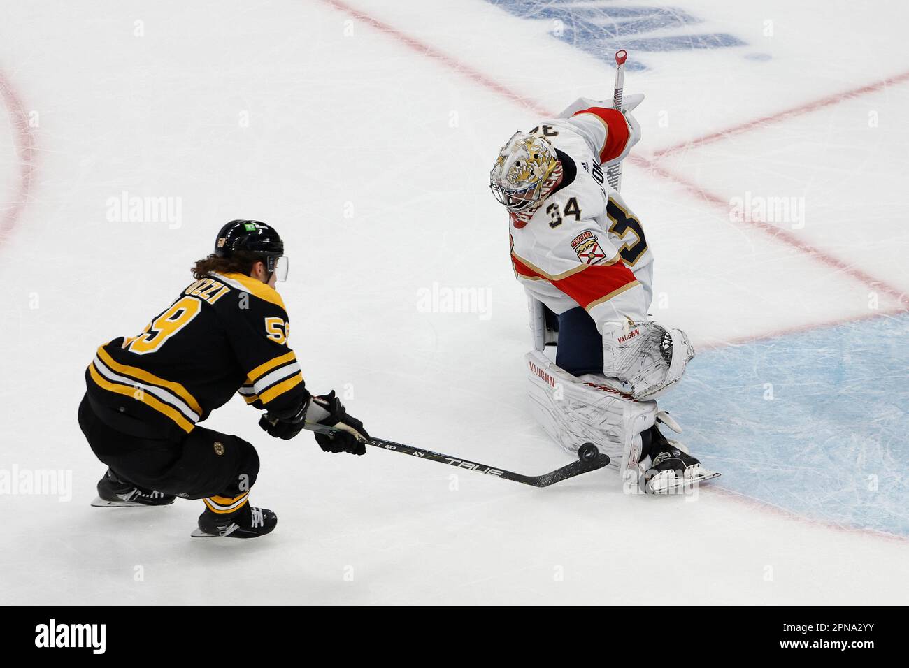 Florida Panthers goaltender Alex Lyon, right, makes a save as Boston ...