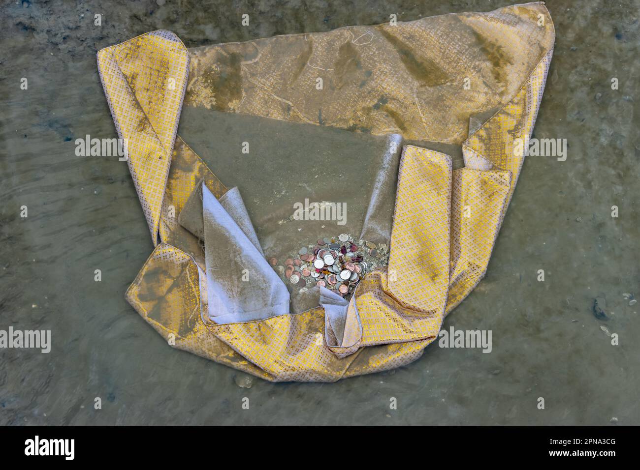 A decoration fabric with coins on a seabed in the mouth of the Chao ...