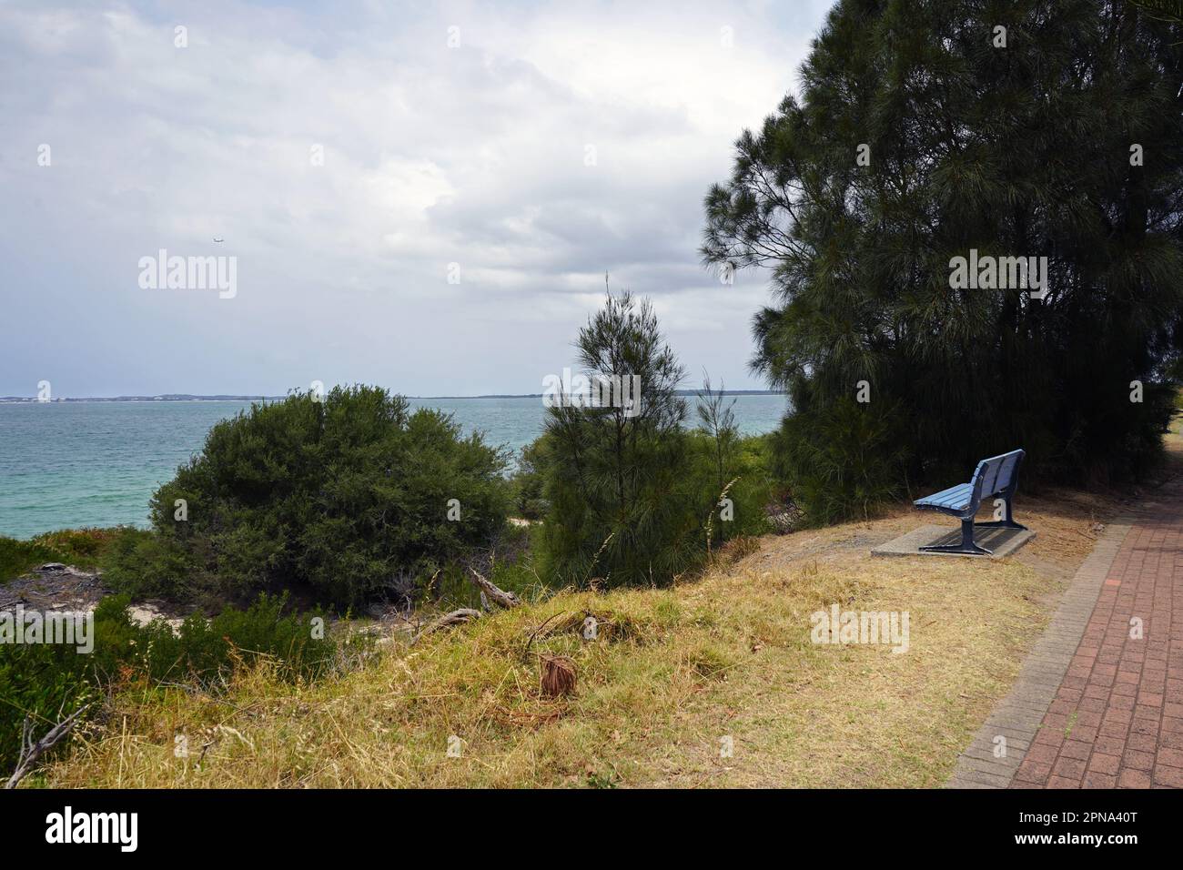 A bench with view of the botany bay sea in southern Sydney Stock Photo ...