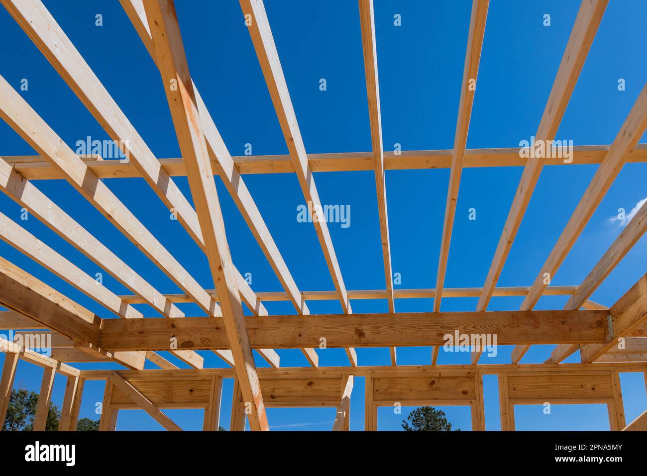 Framing beams are used to construct framework layout of joists in newly ...