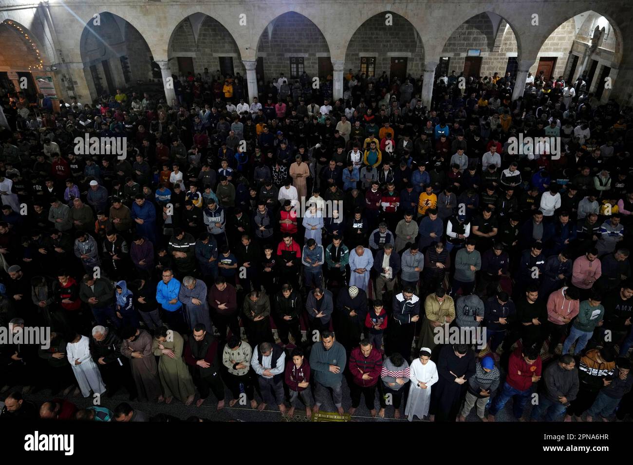 Palestinian Muslim worshippers pray during Laylat al-Qadr, also known ...