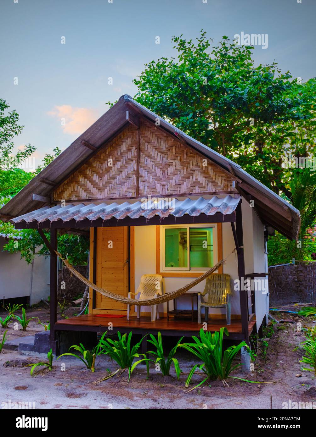 bamboo hut bungalows on the beach in Thailand. simple backpacker accommodation in Thailand Stock ...