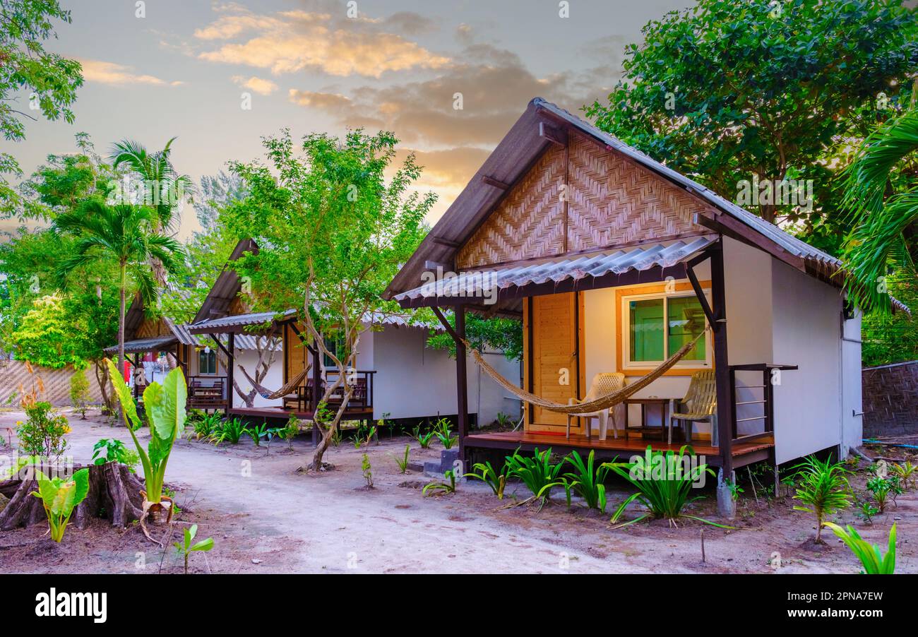 bamboo hut bungalows on the beach in Thailand. simple backpacker ...