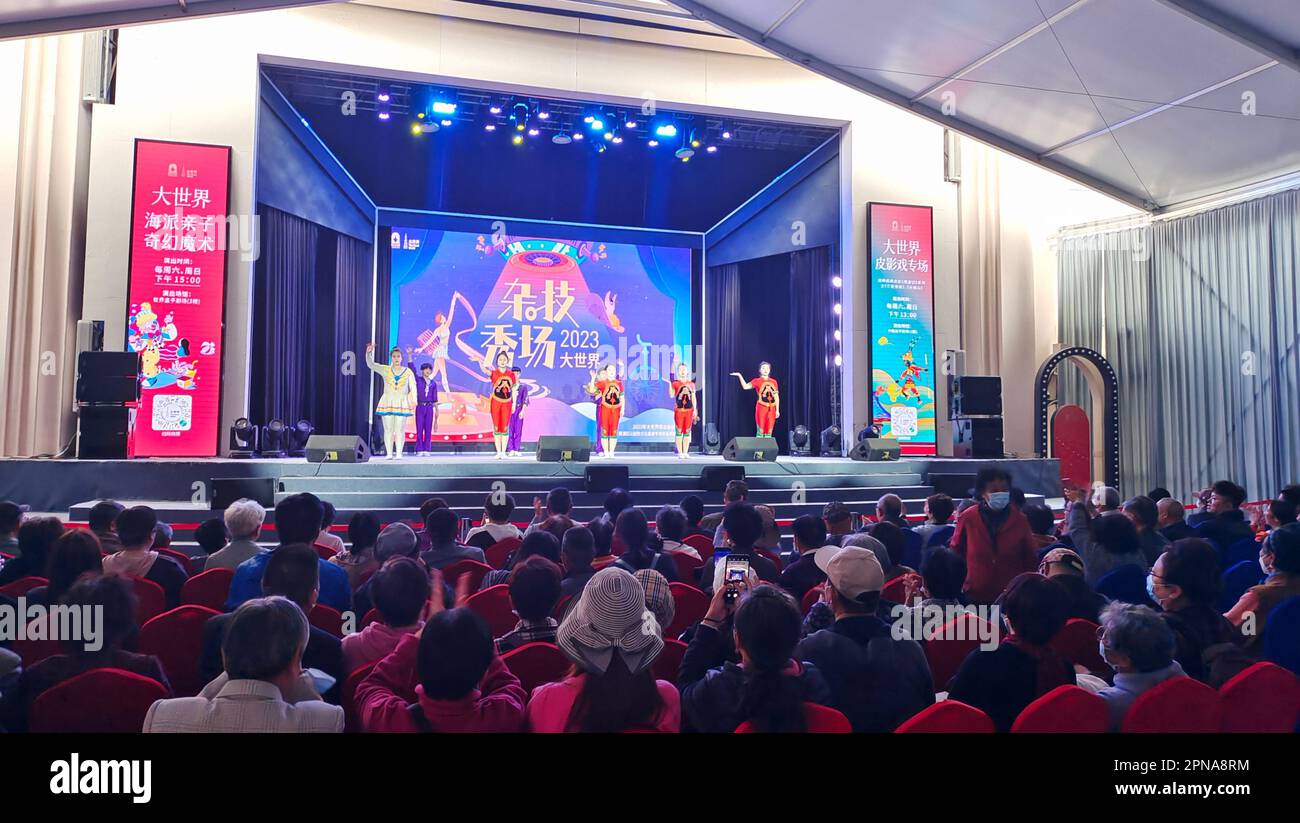 SHANGHAI, CHINA - APRIL 16, 2023 - People watch a performance at the ...