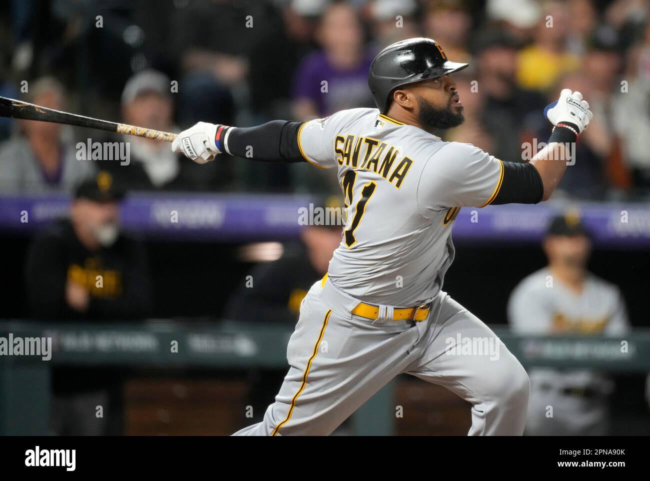 Pittsburgh Pirates first baseman Carlos Santana follows the flight of ...