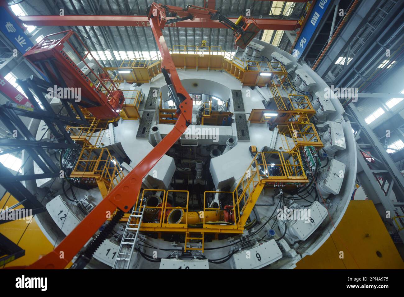 HANGZHOU, CHINA - APRIL 17, 2023 - Workers install parts of China ...