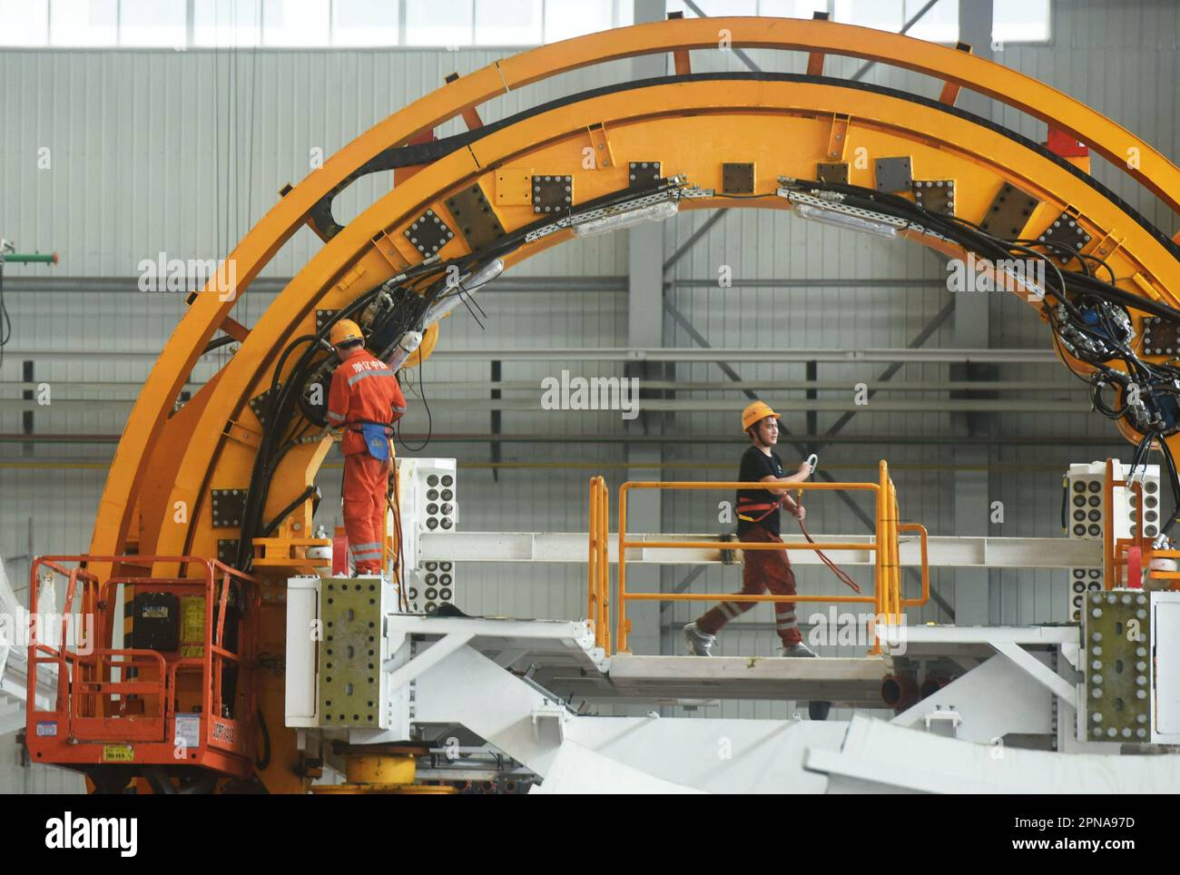 HANGZHOU, CHINA - APRIL 17, 2023 - Workers install parts of China ...