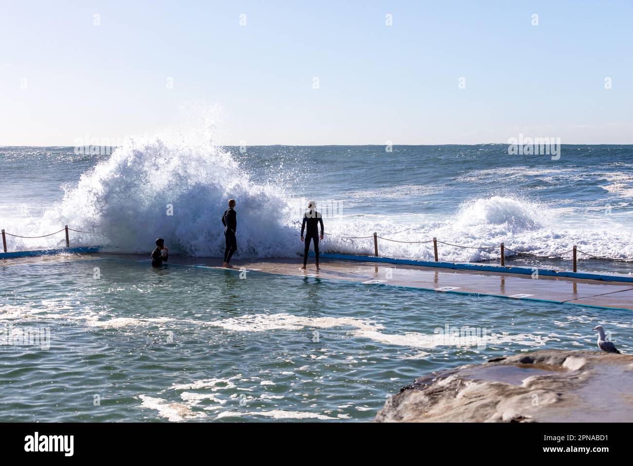 Waves crashing over Dee Why Beach Rockpools, ocean swimming pools Stock ...