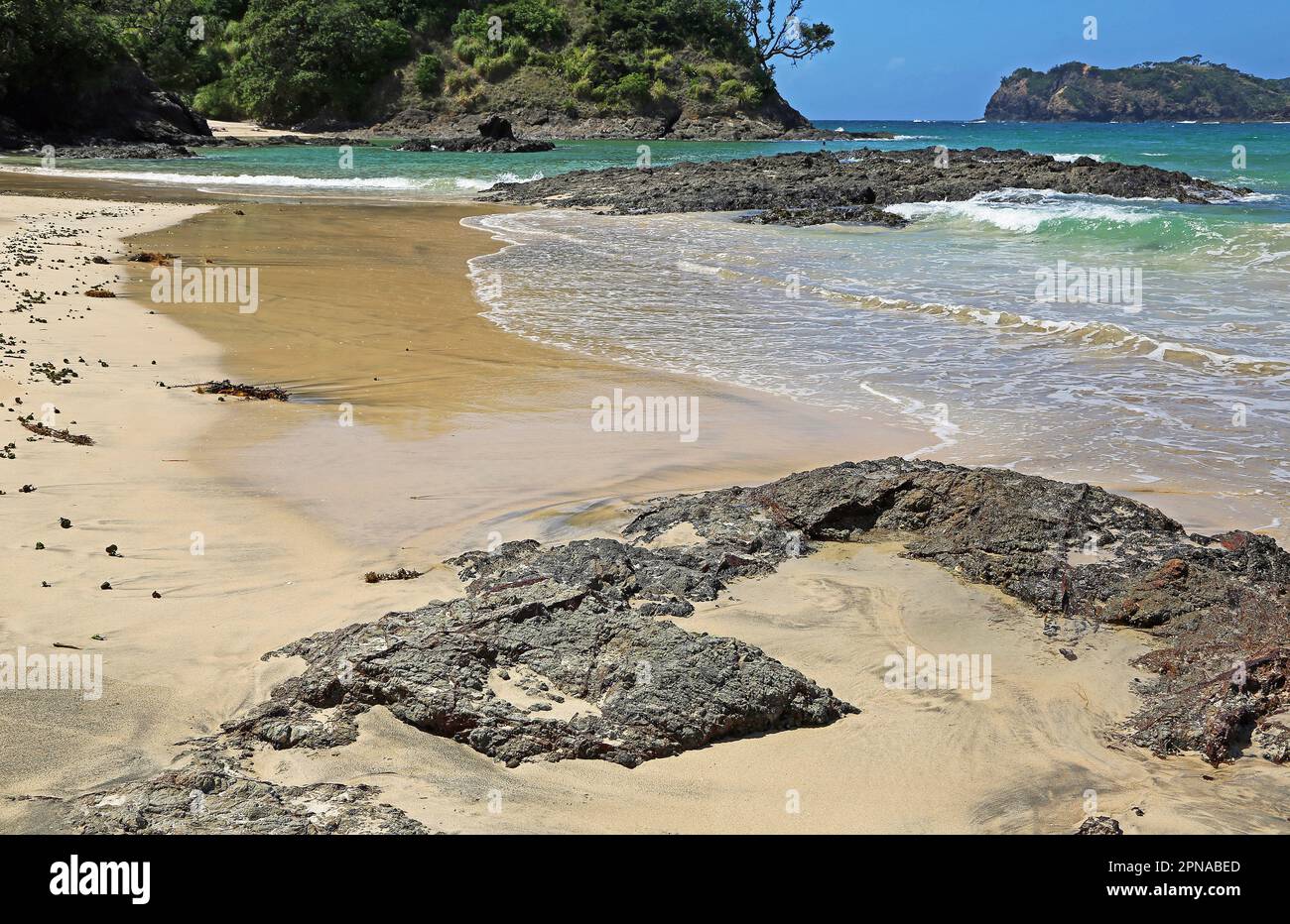 Lava rock on Matapouri Beach - New Zealand Stock Photo - Alamy