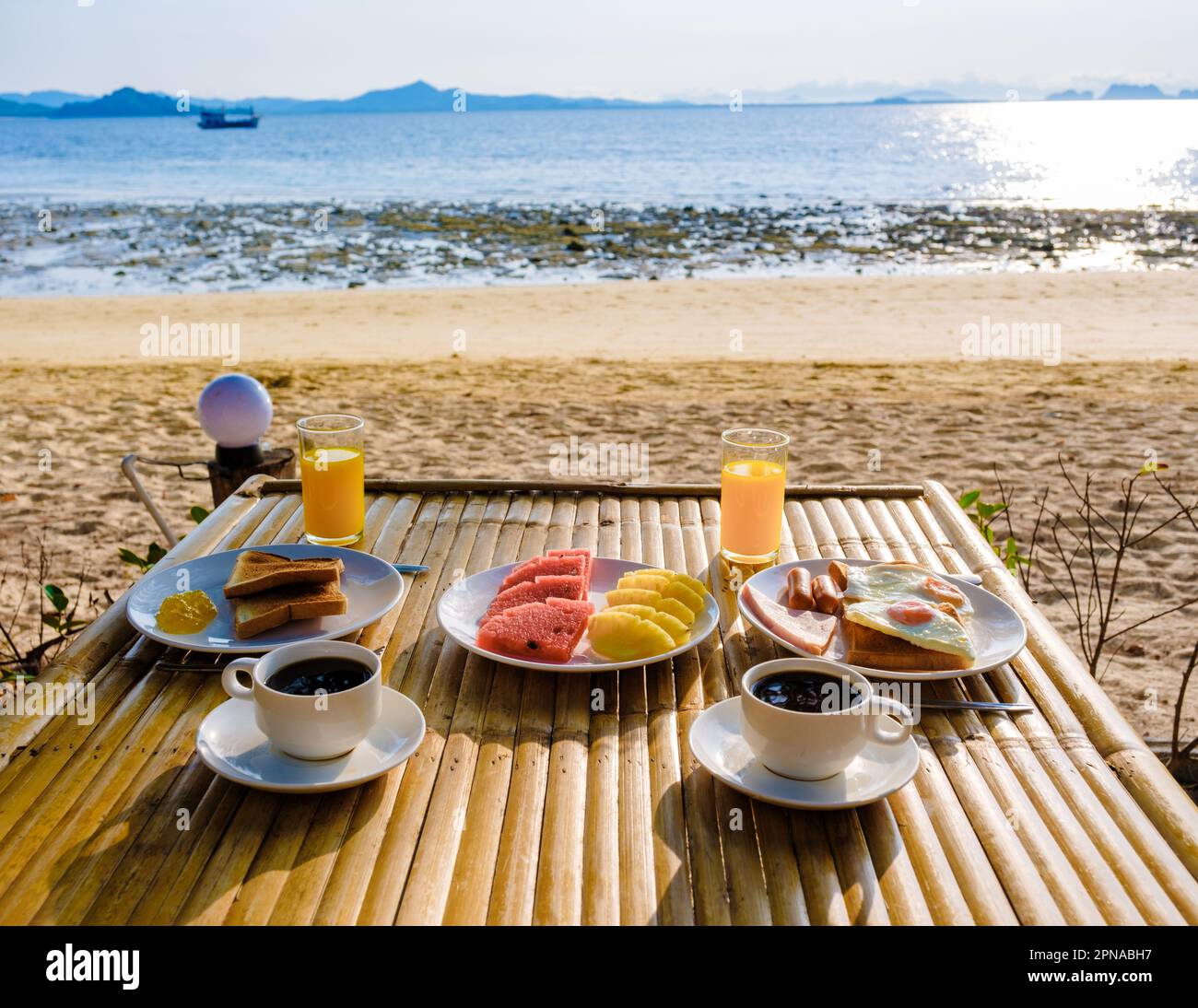 breakfast at the beach of Koh Kradan island in Thailand, breakfast with ...