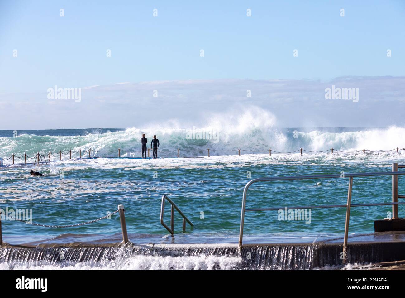 Waves crashing over Dee Why Beach Rockpools, ocean swimming pools Stock ...