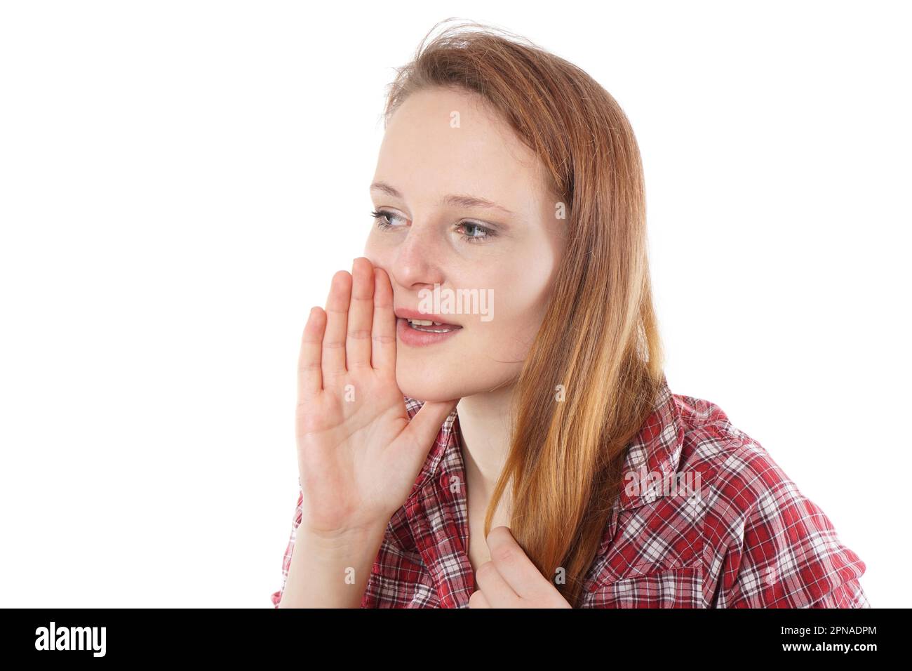 young woman whispering and covering her mouth wih hand Stock Photo - Alamy