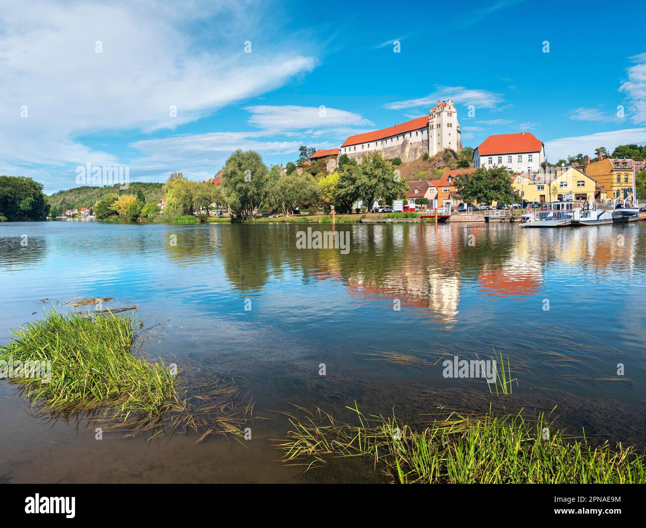 View over the river Saale to Wettin Castle and town, Lower Saale Valley ...