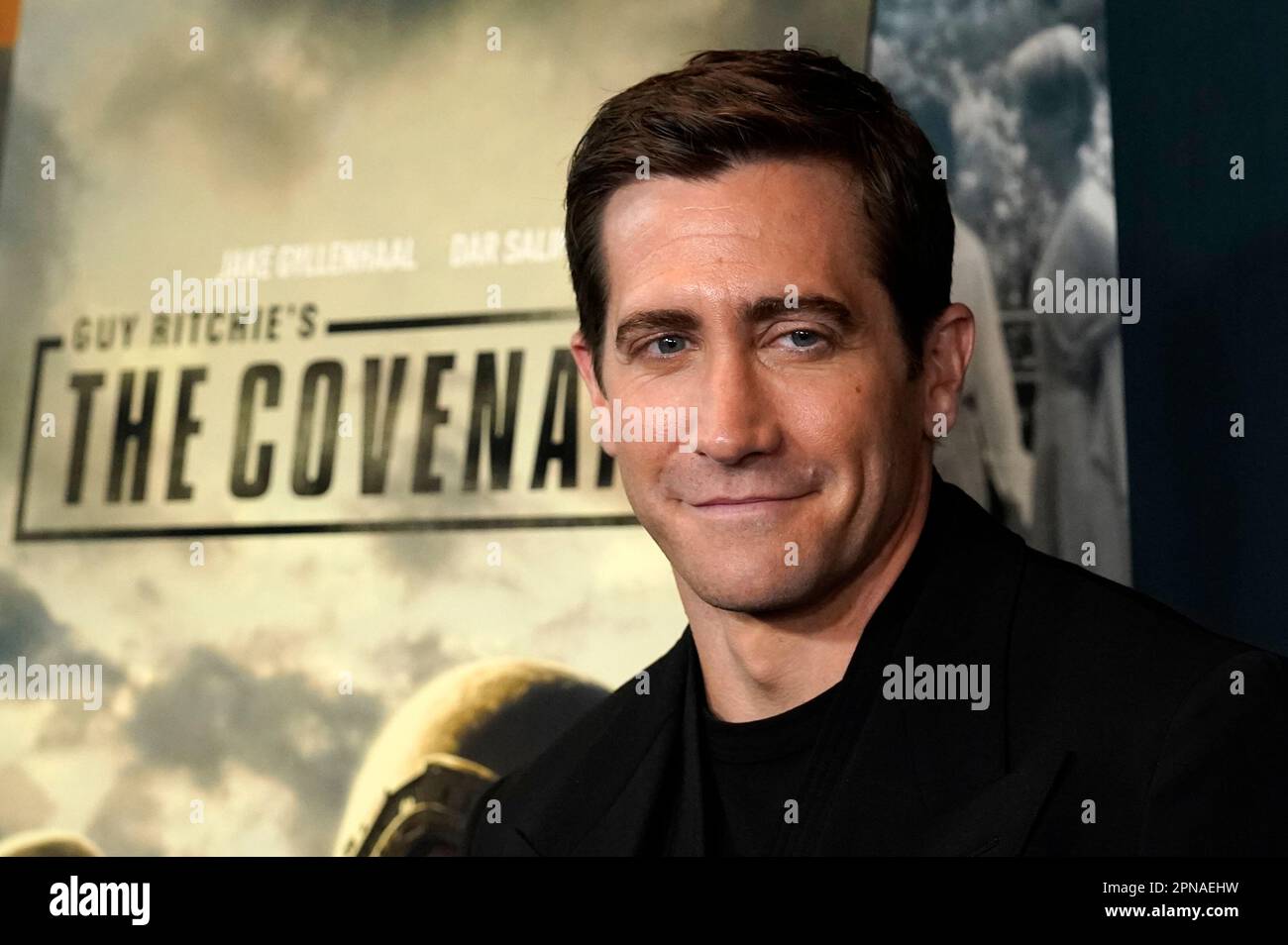 Jake Gyllenhaal, a cast member in "The Covenant," poses at the premiere ...