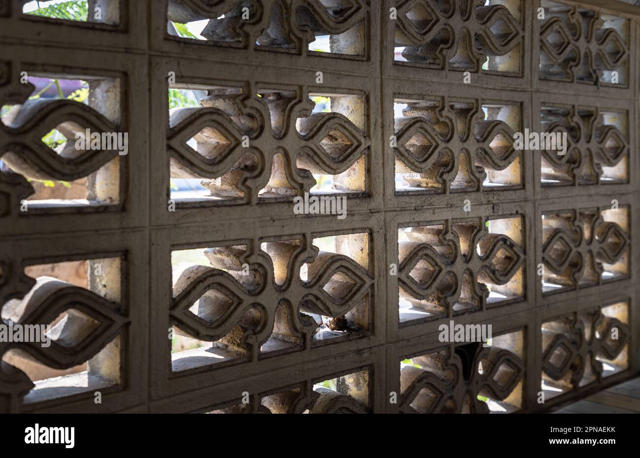 The Sunlight is shining through the Decorative Old Hollow Concrete ...