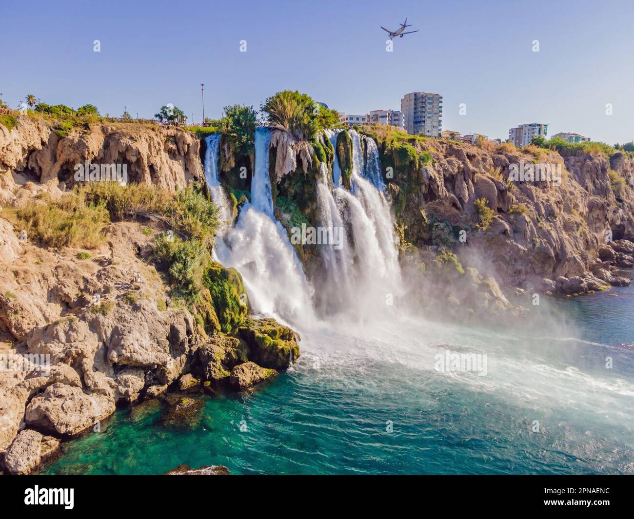 Lower Duden Falls drop off a rocky cliff falling from about 40 m into ...