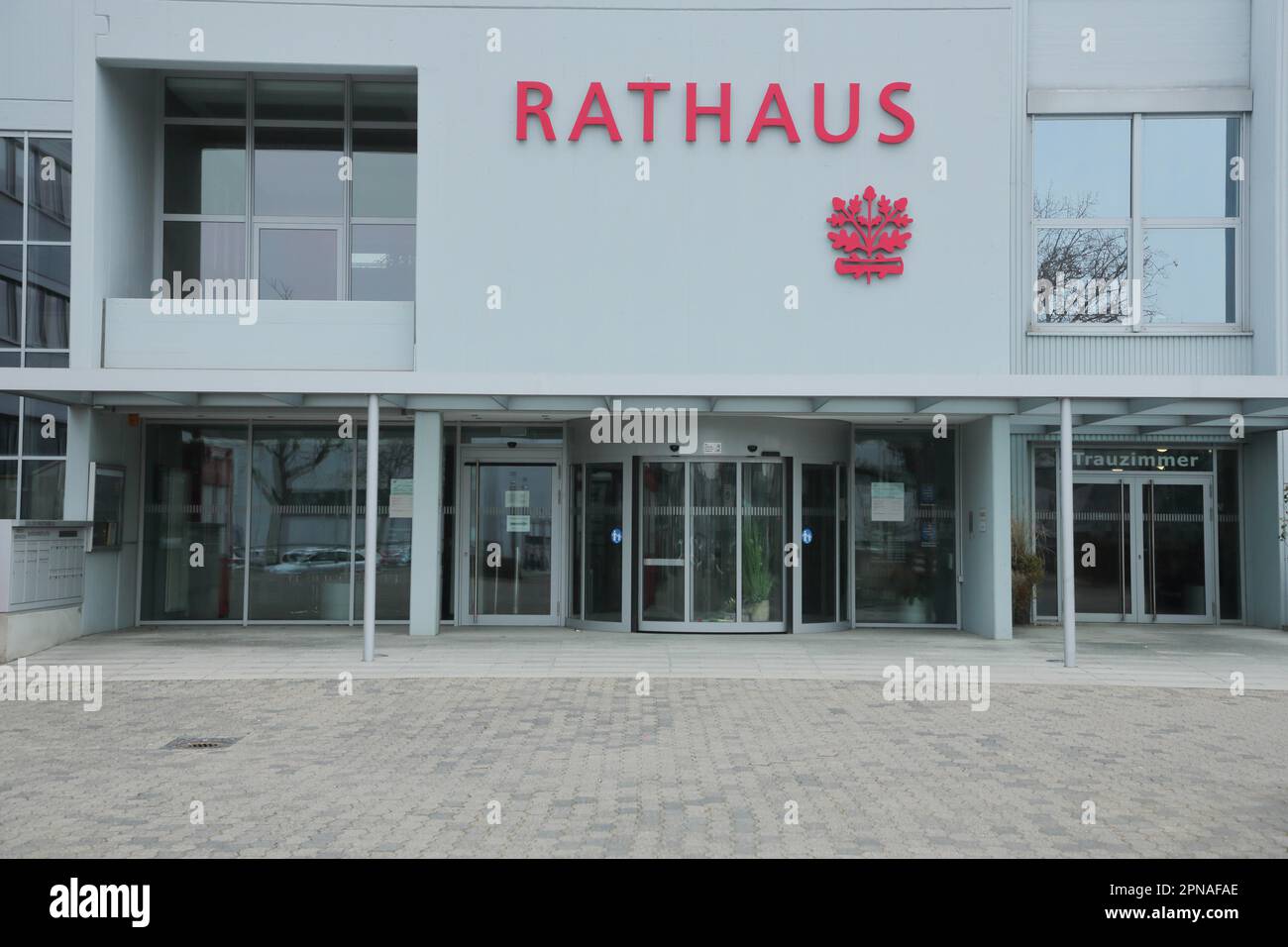Entrance to the town hall with town coat of arms in Langen, Hesse ...