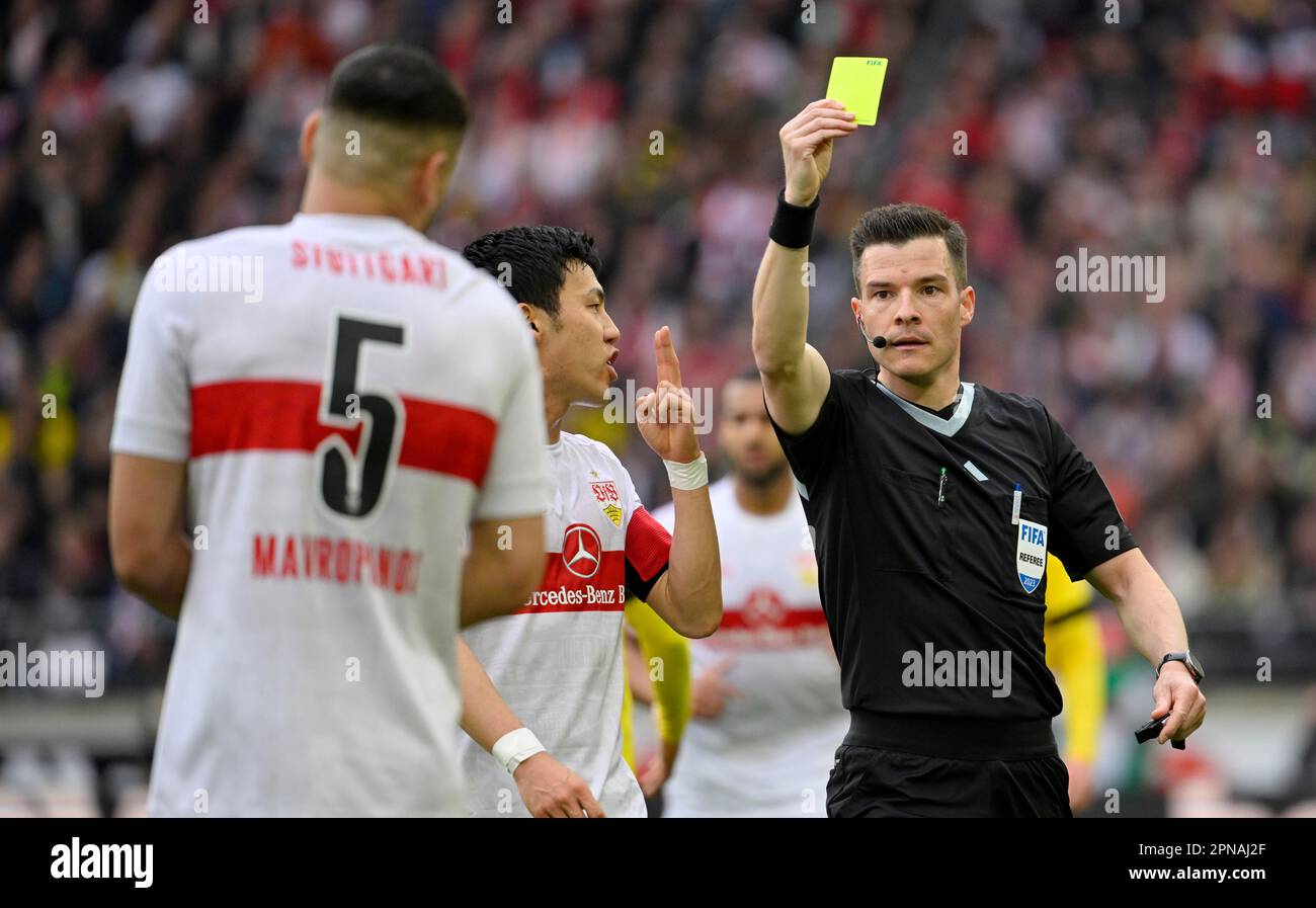 Referee Harm Osmers shows Konstantinos Mavropanos VfB Stuttgart (05 ...