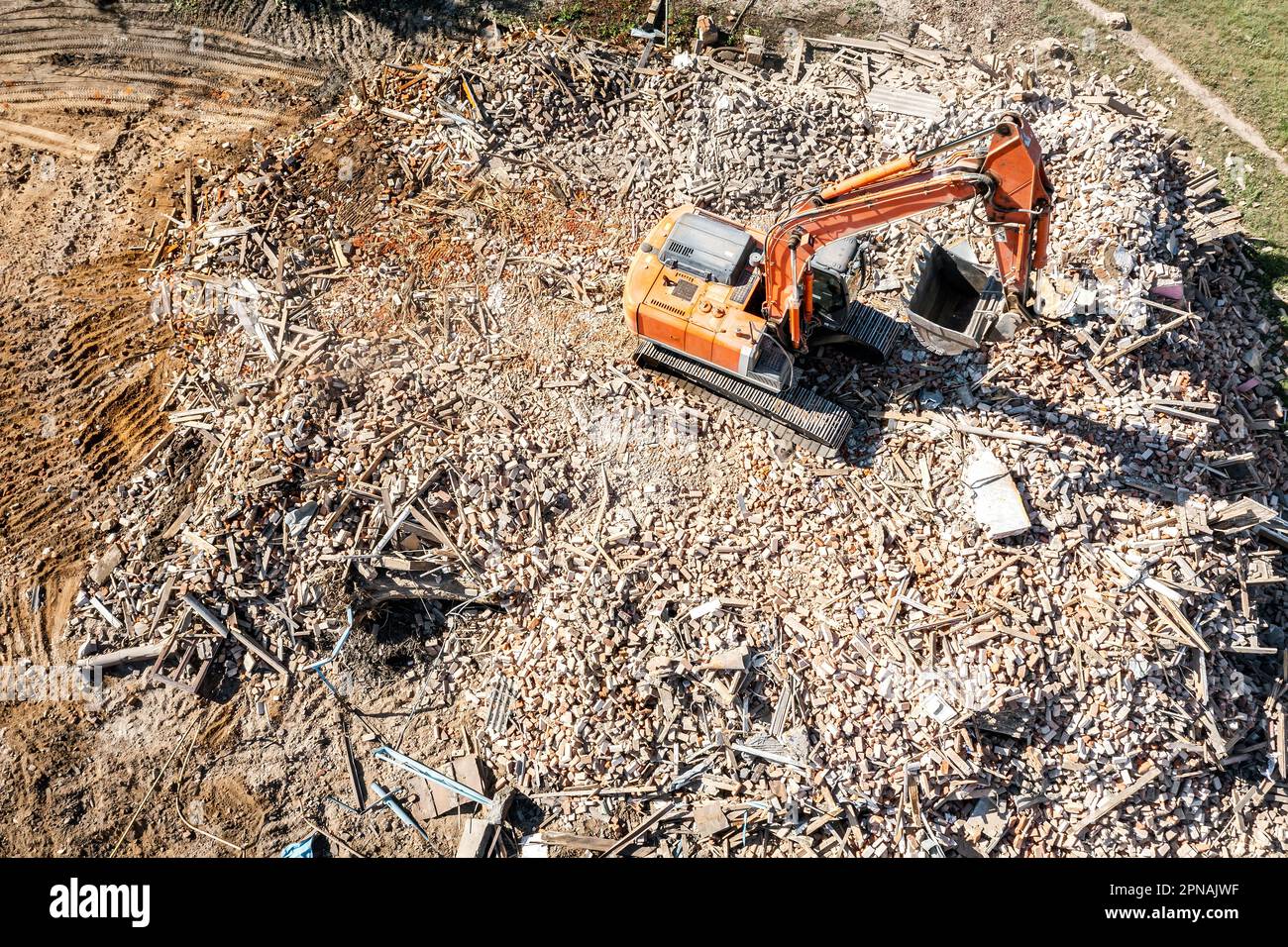 aerial view of excavator on construction site. heavy construction ...