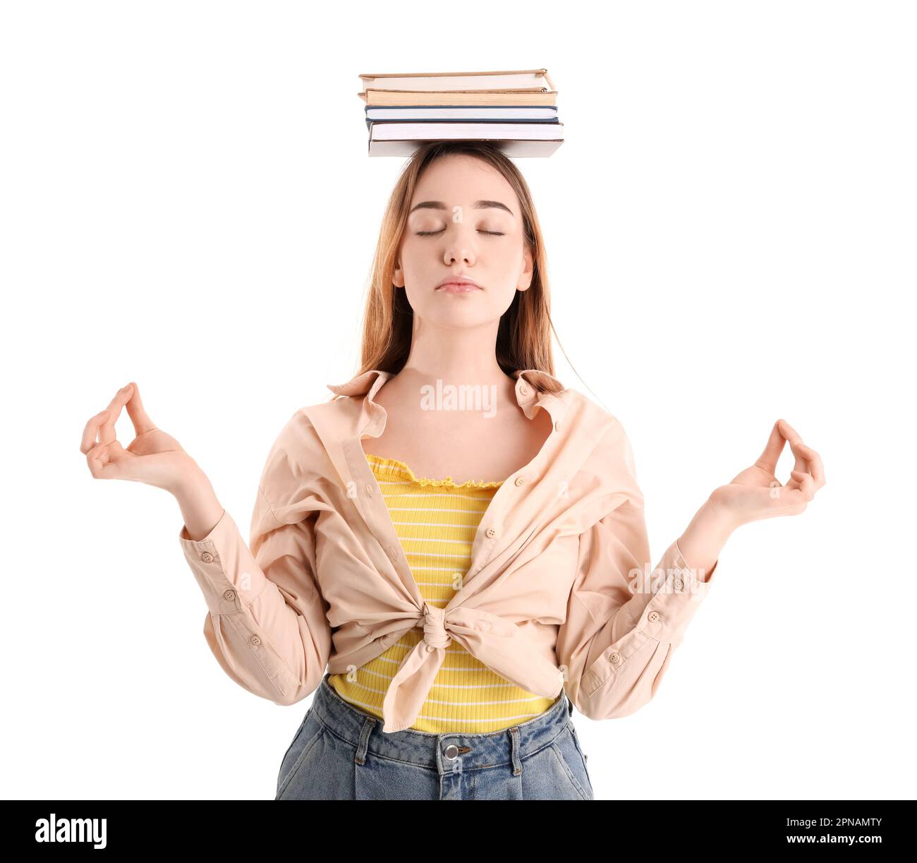 Woman balancing books head hi-res stock photography and images - Alamy