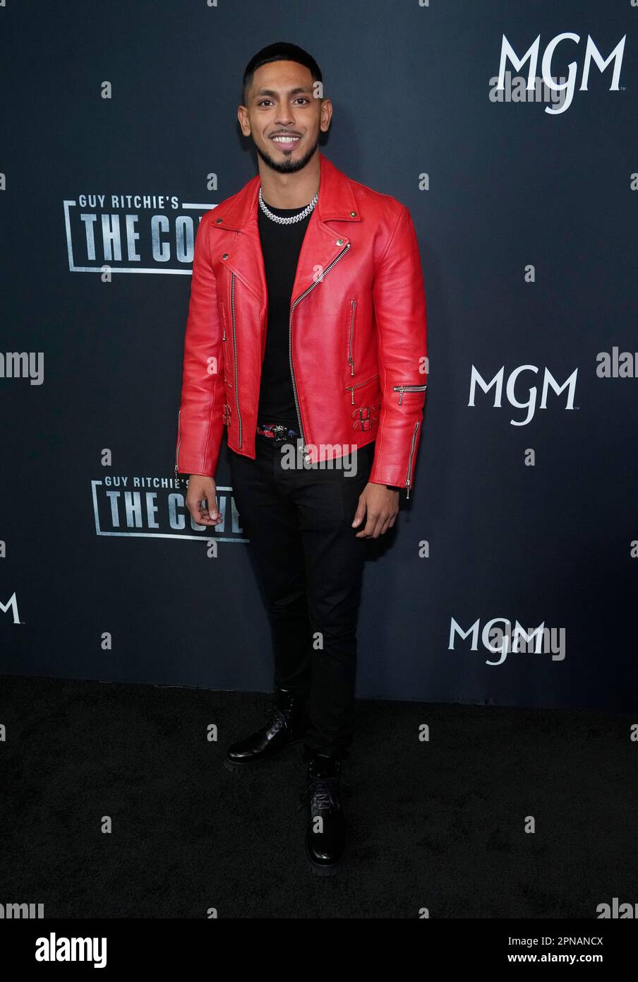 Sean Sagar poses at the premiere of the film "The Covenant," Monday ...