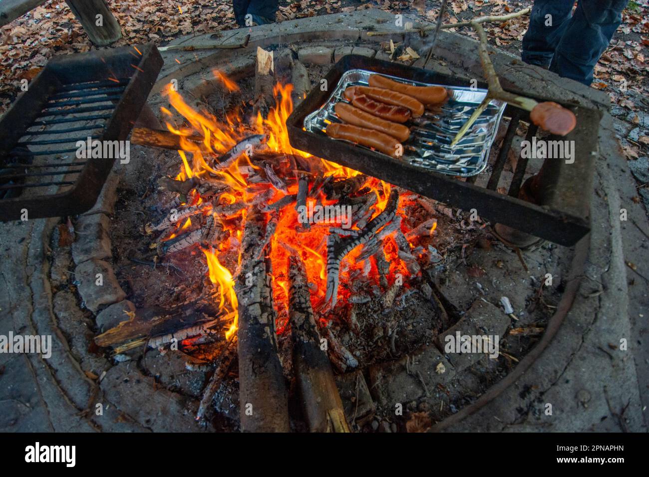 Fire for barbecue in a pubic fire place for hikers in Germany Stock ...