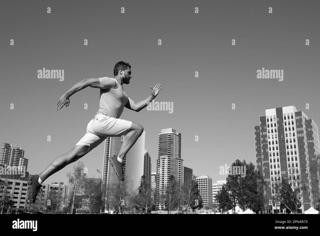 Male runner city Black and White Stock Photos & Images - Alamy