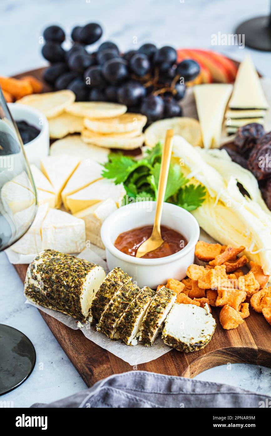 Cheese board with fruits and crackers, close-up. Party food, food ...