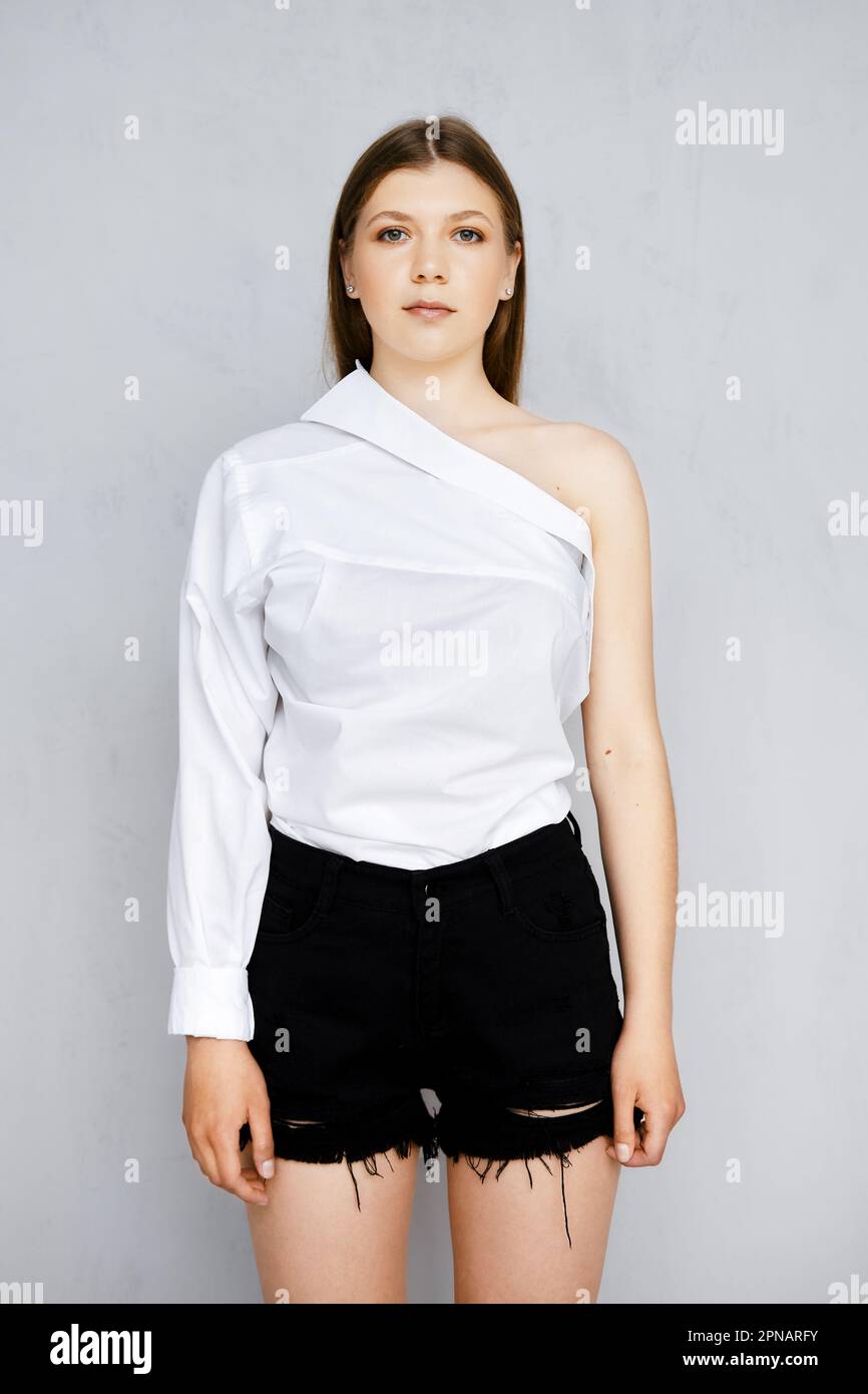 Full body woman standing straight hi-res stock photography and images ...