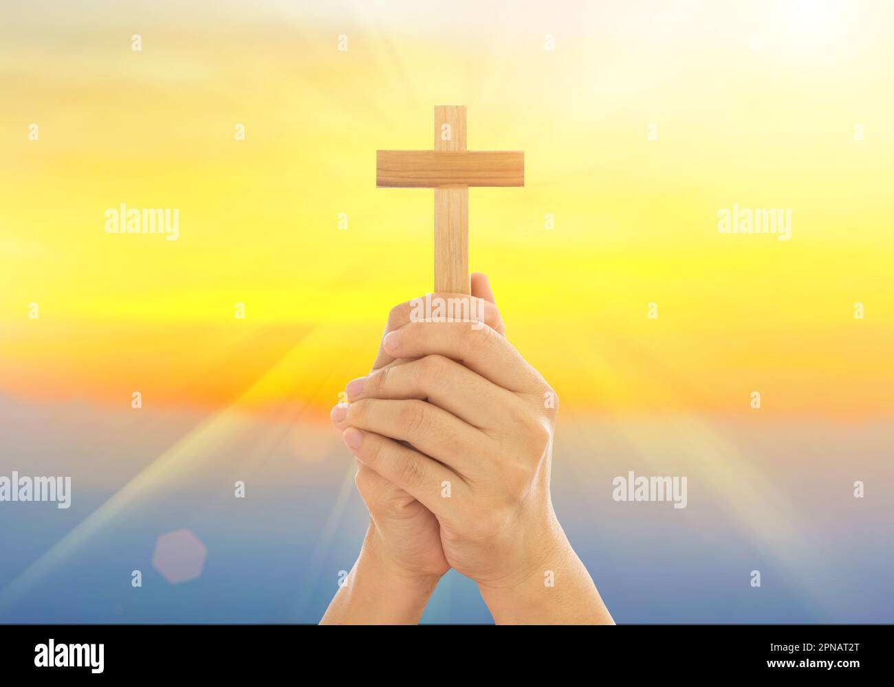 Human hands holding a cross holy and prayed for blessings from God ...