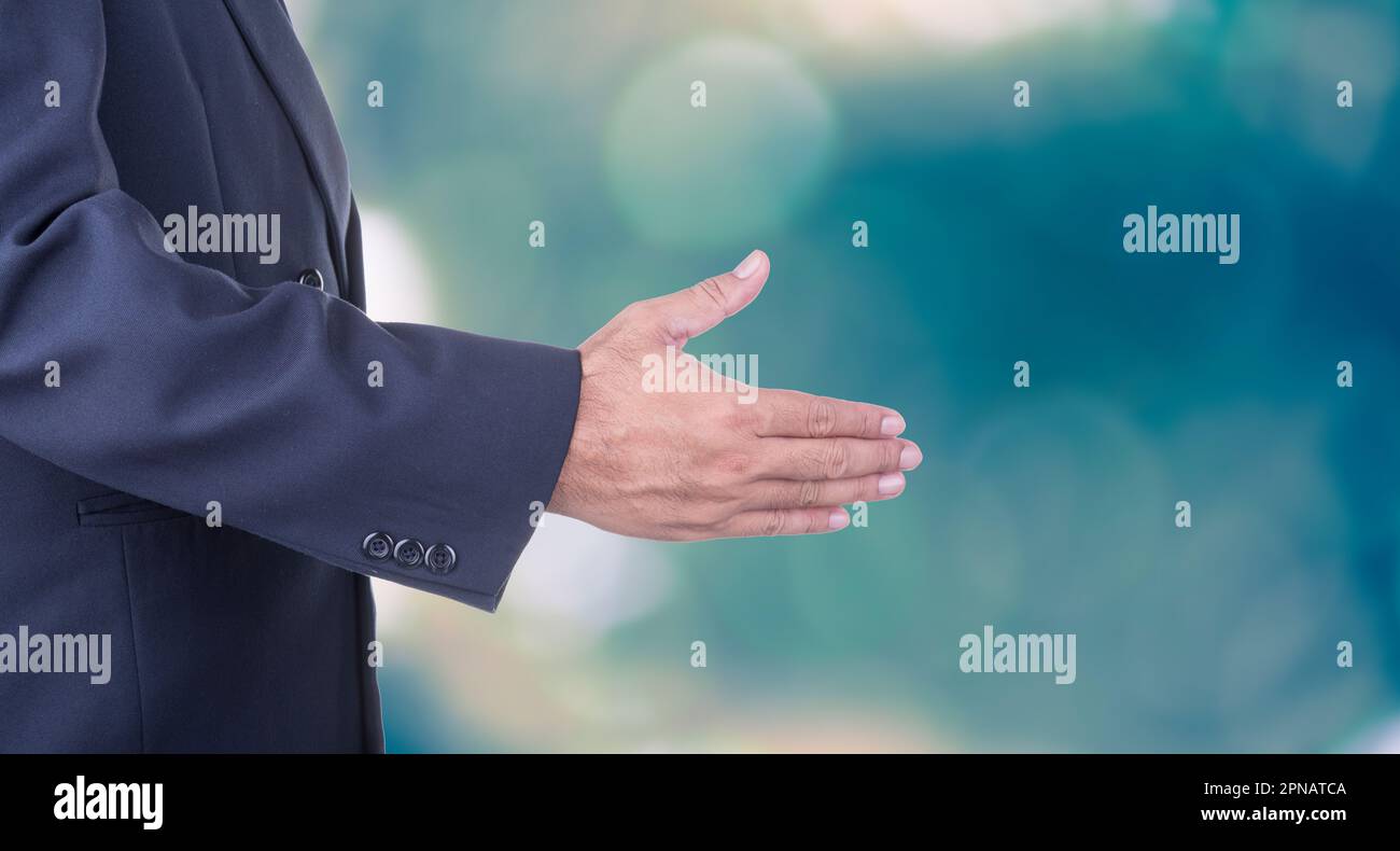 Businessman giving handshake partner hi-res stock photography and ...