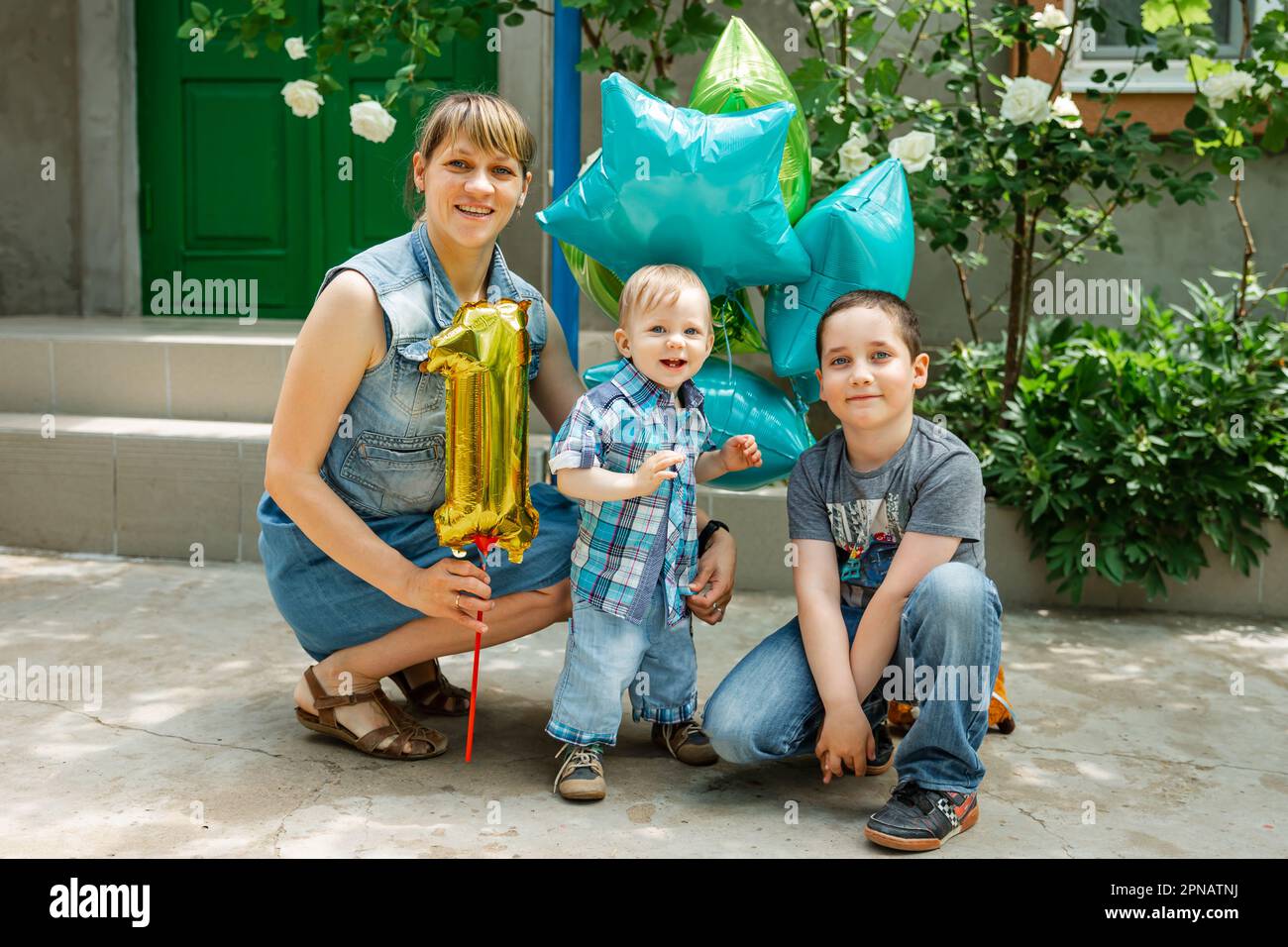 Decoration and photo zone for first year. One year old boy on a party ...