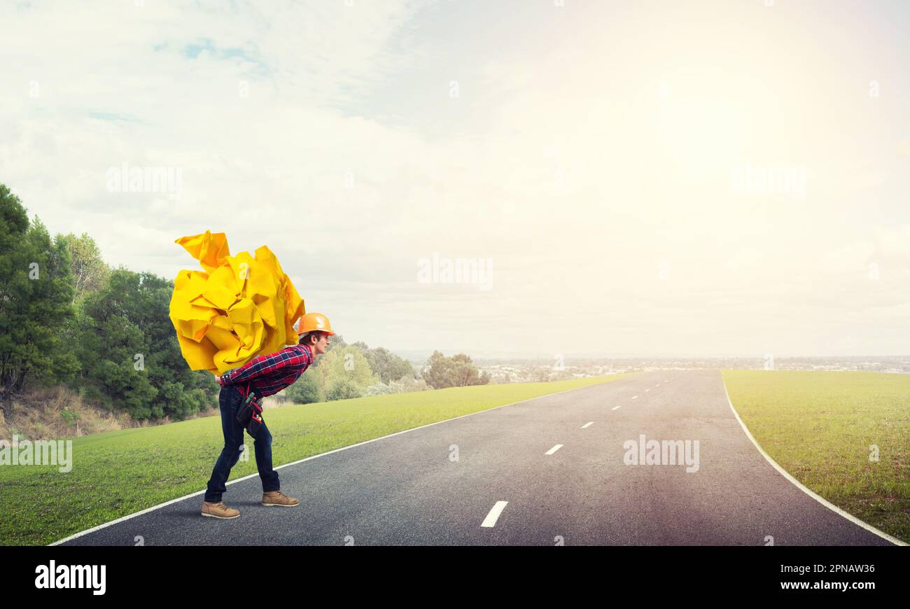 Engineer man carry load Stock Photo - Alamy