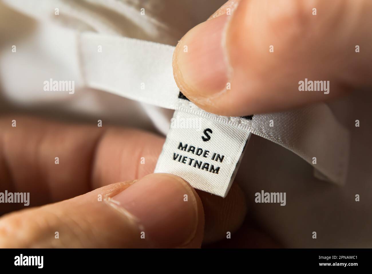 "Made in Vietnam" on a T-shirt label Stock Photo - Alamy