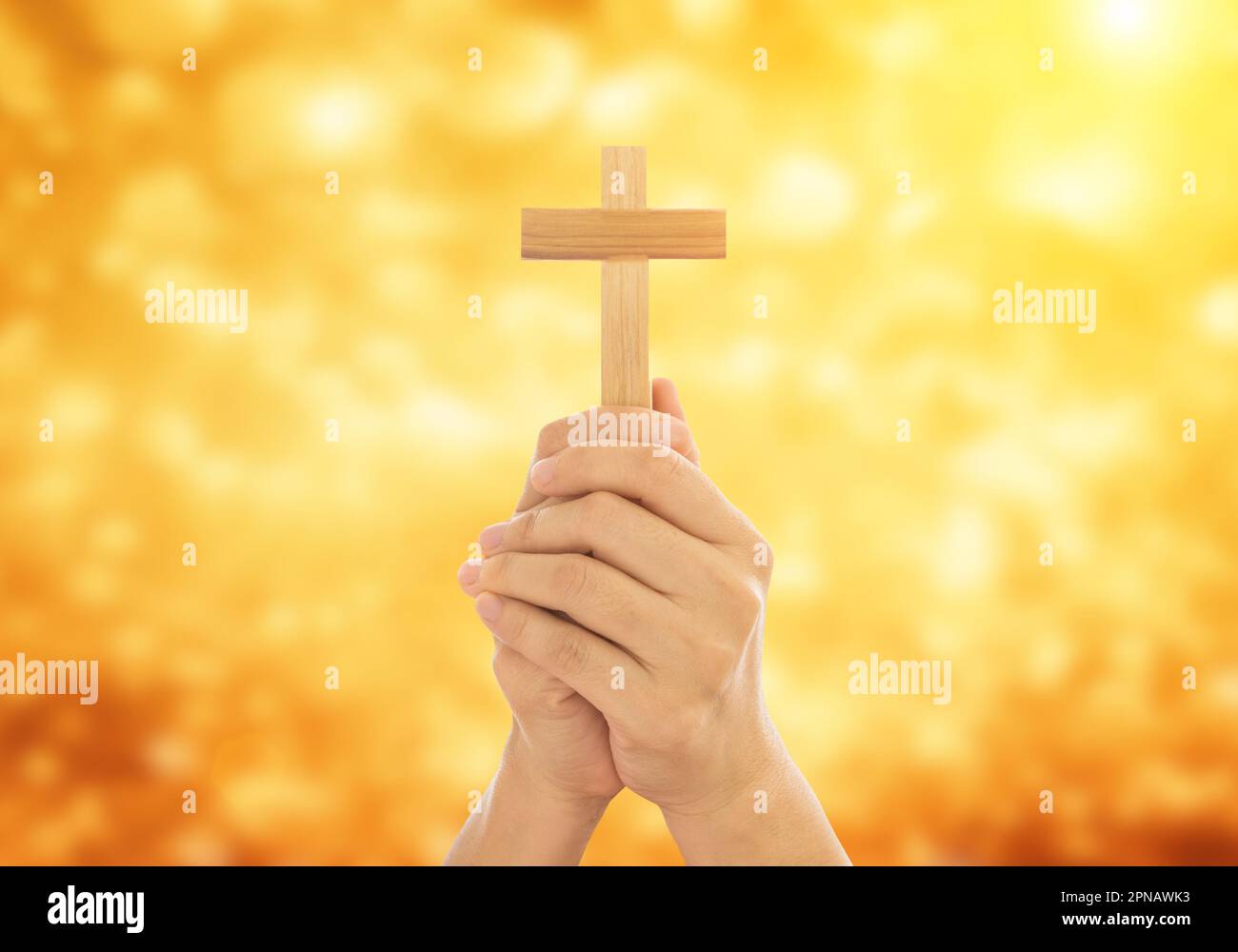Human hands holding a cross holy and prayed for blessings from God ...