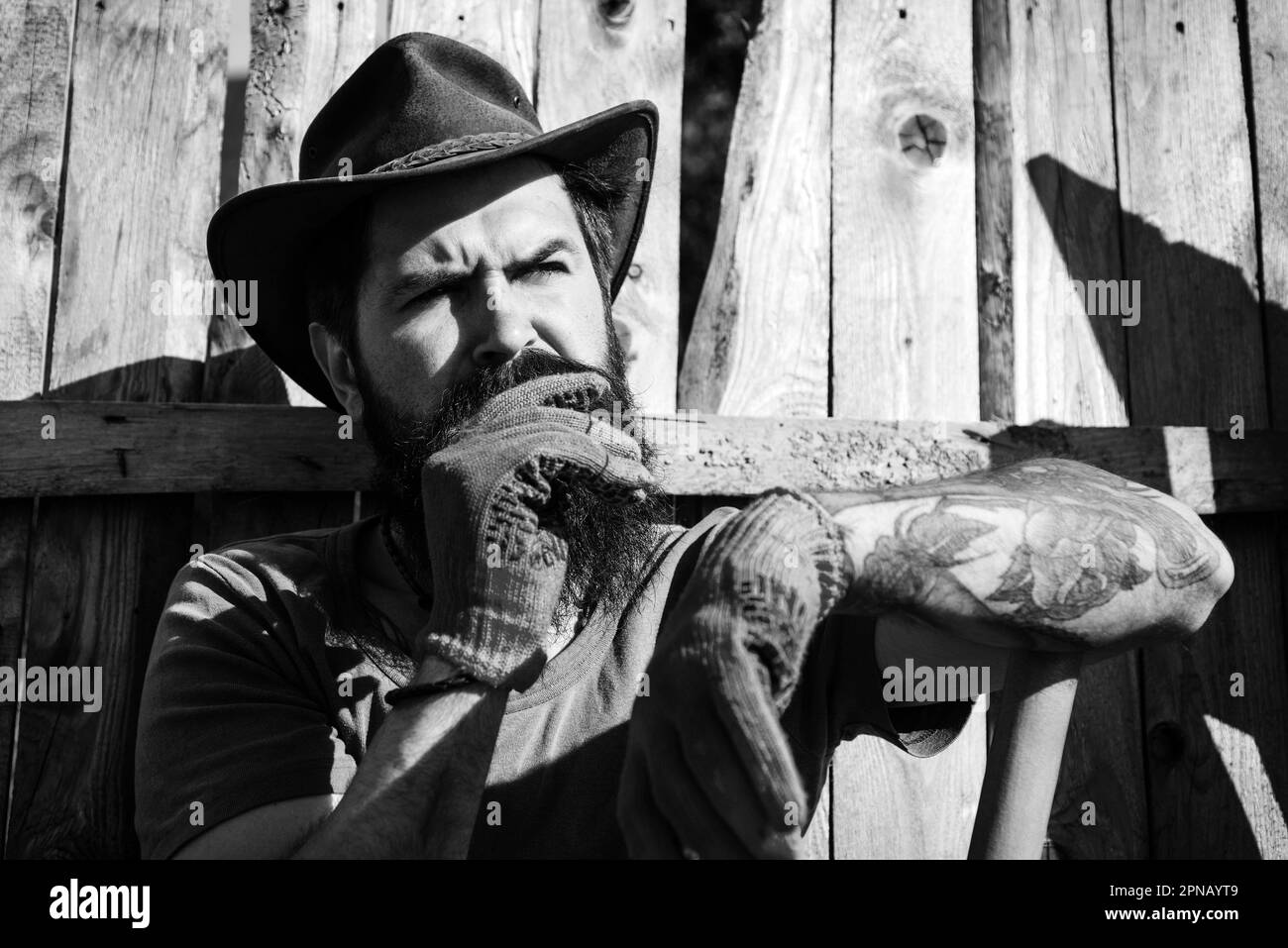 Portrait of Farmer in the farm on countryside background. Rural scene ...