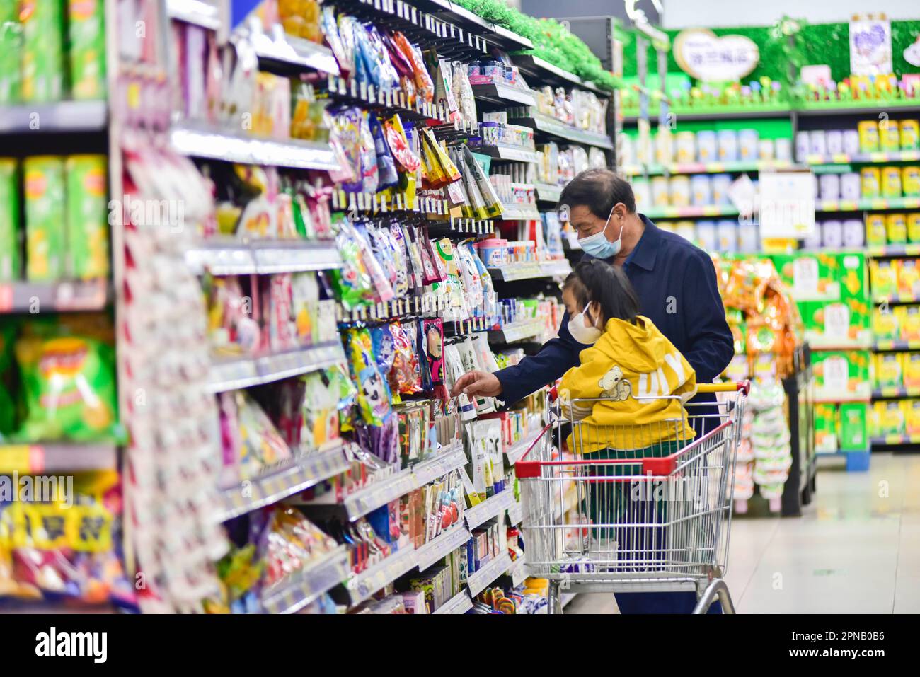 QINGZHOU, CHINA - APRIL 17, 2023 - Customers choose products at a ...