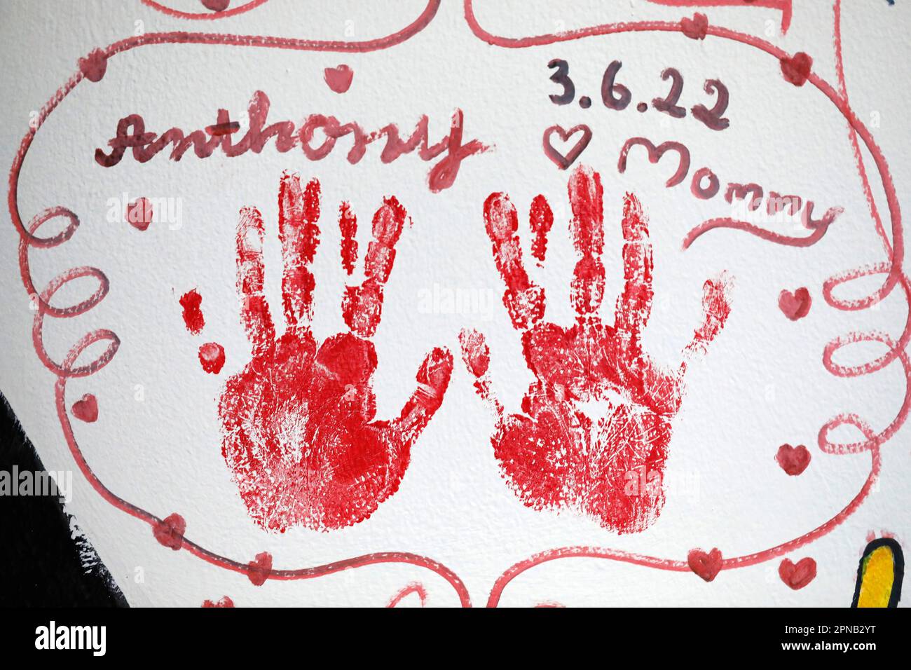 Red child hand imprints on the side of a wall. Phu Quoc. Vietnam Stock ...