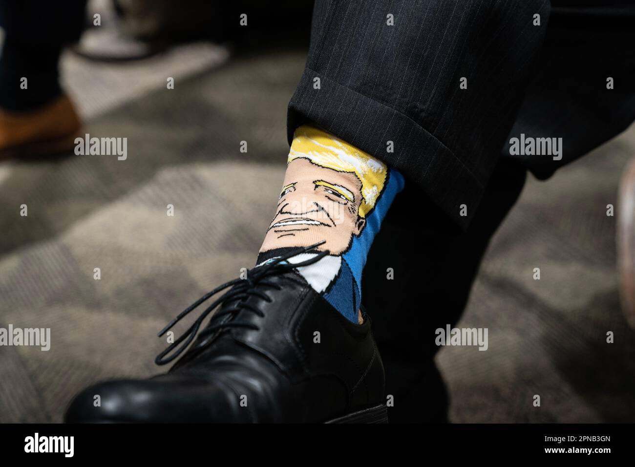 Congressman Troy Nehls (R) wearing socks with Trump image as attending ...